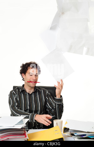 Man stressed doing paper work Stock Photo - Alamy