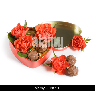 Red roses flower and present box on white stone table. Holiday ...
