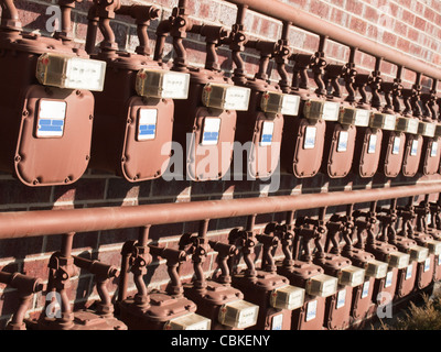 Water meters on the wall of apartment building Stock Photo - Alamy