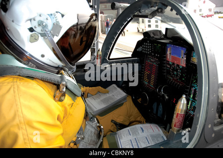 Lt. Col. Lars Hoffman reviews his checklist before flying the new U-2S ...
