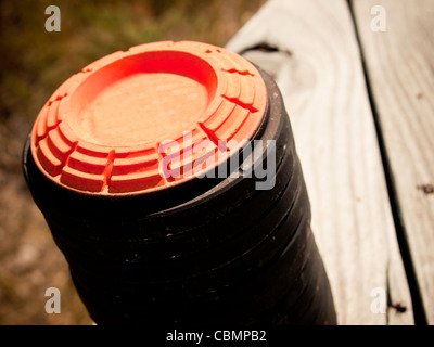 Stack of orange clay pigeons Stock Photo - Alamy