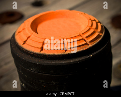 Stack of orange clay pigeons Stock Photo - Alamy