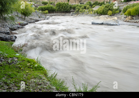 Fast, affluent and muddy mountain Nepal river near Jomsom village Stock ...