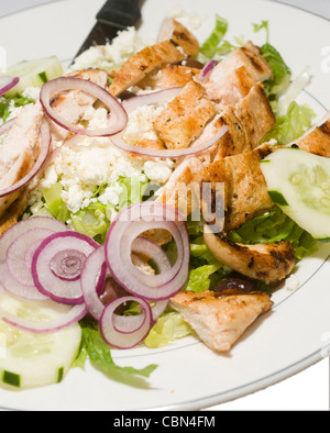 Greek salad with feta cheese and pieces of dried rye bread Stock Photo ...