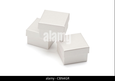 Three Small White Cardboard Boxes Stacked Cut Out Stock Photo - Alamy