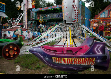 Fairground roundabout Star Wars rocket ride with blue Flash Gordon ...
