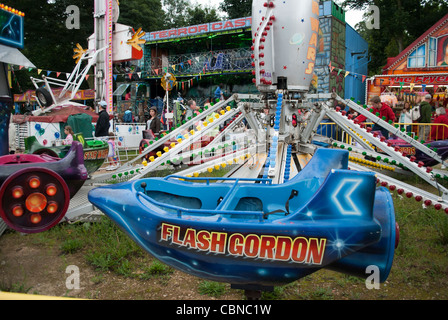 Fairground roundabout Star Wars rocket ride with blue Flash Gordon ...