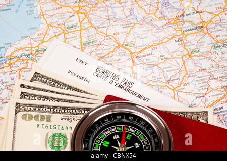 compass, money and passport with boarding pass Stock Photo - Alamy