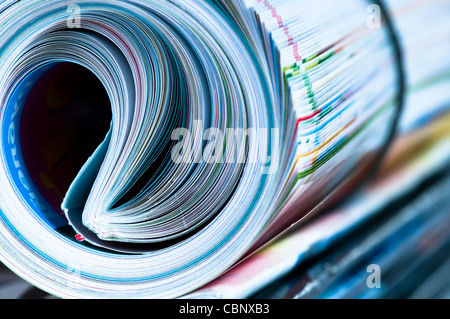 Magazine Roll. Side view. Blue toned Stock Photo - Alamy