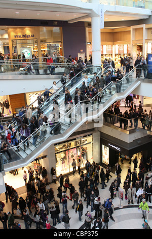 busy crowd inside shopping mall multi level Stock Photo - Alamy