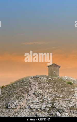 Wooden shelter on the cliff top over looking the sandy beach inn ...