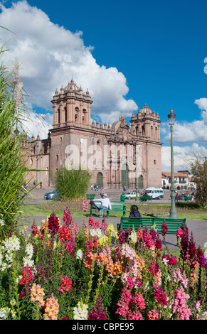 Beautiful visual image of Main Square thru flowers in sunshine of Cusco ...