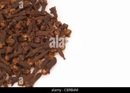 Stack of whole clove buds isolated with copy space Stock Photo - Alamy