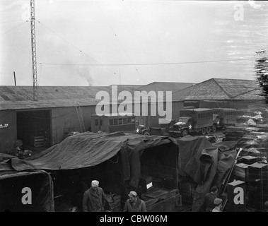 Warehouse scene WWII Americans in england preparing for invasion of ...