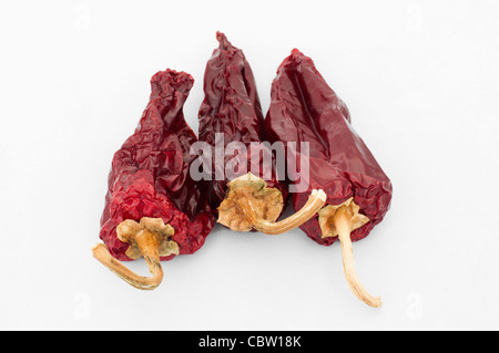 Dried big red peppers. White isolated Stock Photo - Alamy