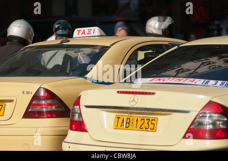 Yellow Greek taxi cab in Athens, Greece Stock Photo - Alamy