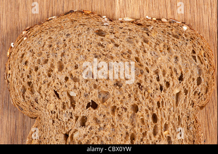 A slice of brown bread,up close Stock Photo - Alamy
