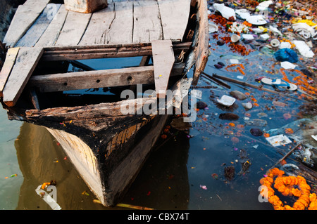 India - Varanasi - River Ganges - sewage pipe and laundryman Stock ...