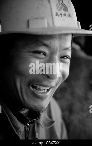 Gaobeidian, Beijing. Portrait of a migrant worker during lunchtime ...