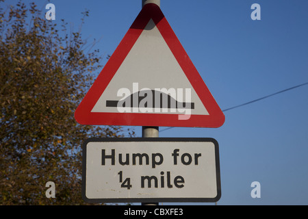 Speed hump sign, England Stock Photo - Alamy