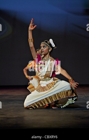 Indian dancers on stage wearing traditional costume Stock Photo - Alamy