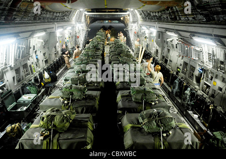 Container delivery system bundles drop out of a C-17 Globemaster III ...