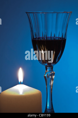 red wine glass against blue sky Stock Photo - Alamy