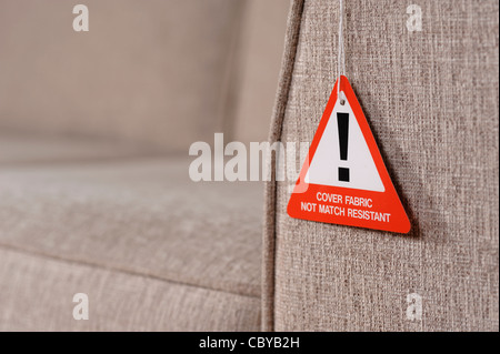 Sofa fire safety warning label Stock Photo - Alamy