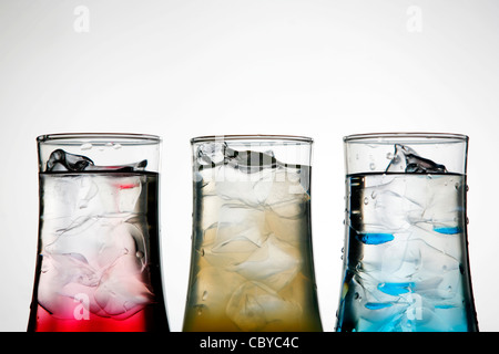 Three colored cocktails in a row Stock Photo - Alamy