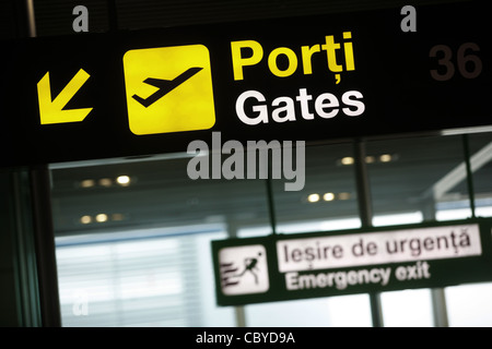 Emergency exit sign at airport, Terminal 5, Heathrow airport, London ...