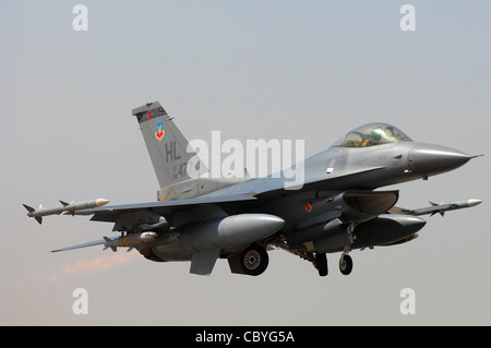 F-16 Fighting Falcons, like the one shown here, sit ready to deploy at ...