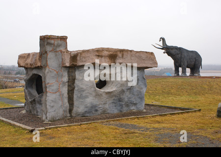 Pre-historic Mastodon model behind cave man car, Stewiacke, Nova Scotia ...