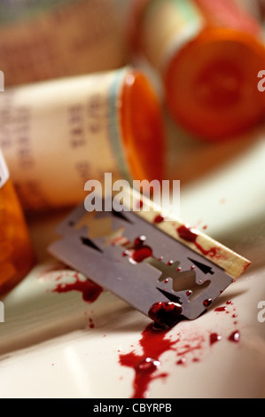 Looking at pills on a sink counter with bloody razor at hotel room ...