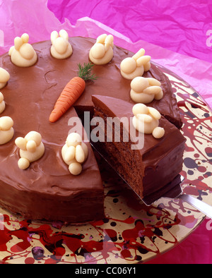 Chocolate paschal cake with marzipan decoration (rabbits Stock Photo ...
