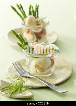White asparagus with smoked salmon and egg sauce FoodCollection Stock ...