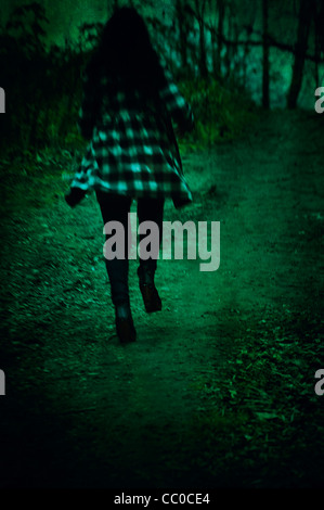 Woman in danger running away Stock Photo - Alamy