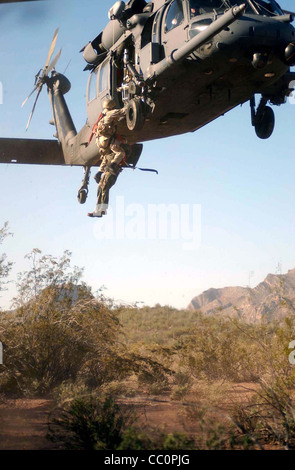 A 305th Rescue Squadron HH-60 and 79th Rescue Squadron HC-130J are ...