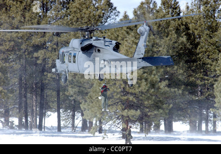A 305th Rescue Squadron HH-60 and 79th Rescue Squadron HC-130J are ...