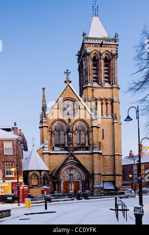 Early winter snow at the church of St John the Evangelist in the ...