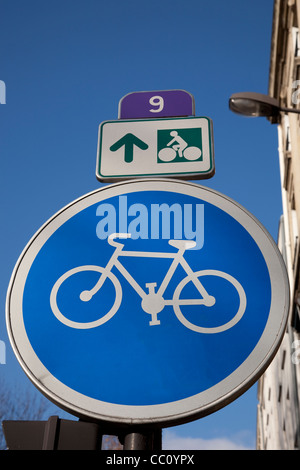 Blue cycle lane sign Stock Photo - Alamy