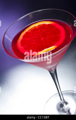 Negroni cocktail in front of colored background Stock Photo - Alamy