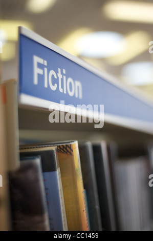 Fiction library signage on shelving Stock Photo - Alamy