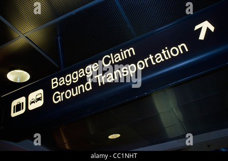 Baggage claim ground transportation sign in airport Stock Photo - Alamy