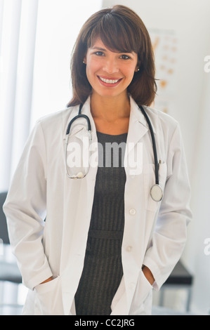 Friendly female doctor portrait Stock Photo - Alamy
