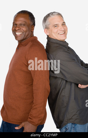 Studio portrait of two mature men Stock Photo - Alamy