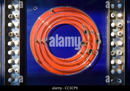 Old Timey, antique orange and blue Neon sign Stock Photo - Alamy