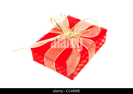 Big red present with golden ribbon over white background Stock Photo ...