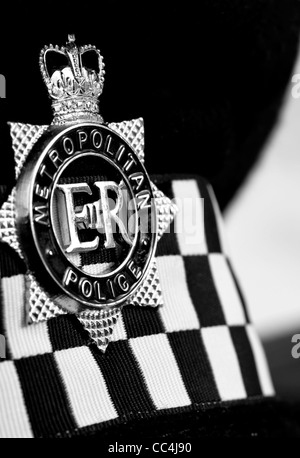 Silver London Metropolitan Police Service symbol printed onto blue ...