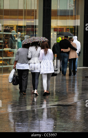 People getting wet in Exeter, Devon, UK Stock Photo - Alamy
