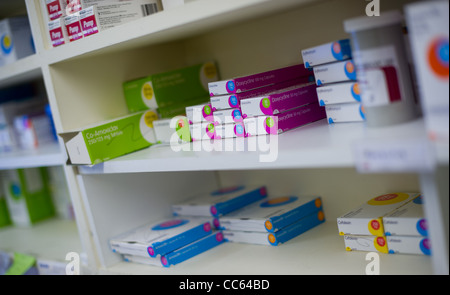 dispensary chemist display shelves of drugs and packets Stock Photo - Alamy